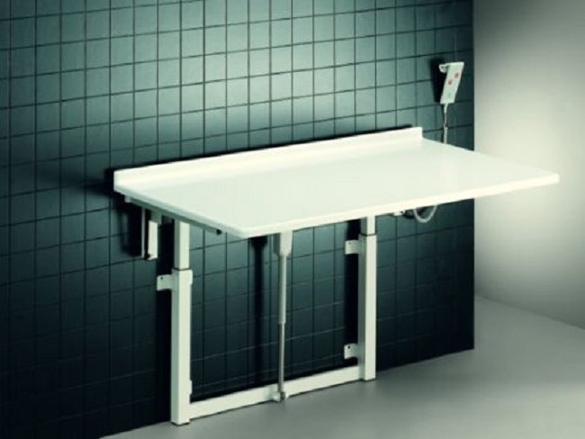 Pressalit Care Okapi Wall Mounted Adjustable Height Changing Table